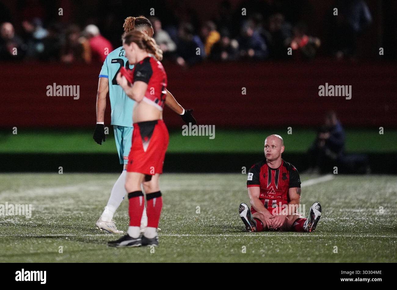 Tamworth's Tom Tonks (right) looks dejected after the Emirates FA Cup ...