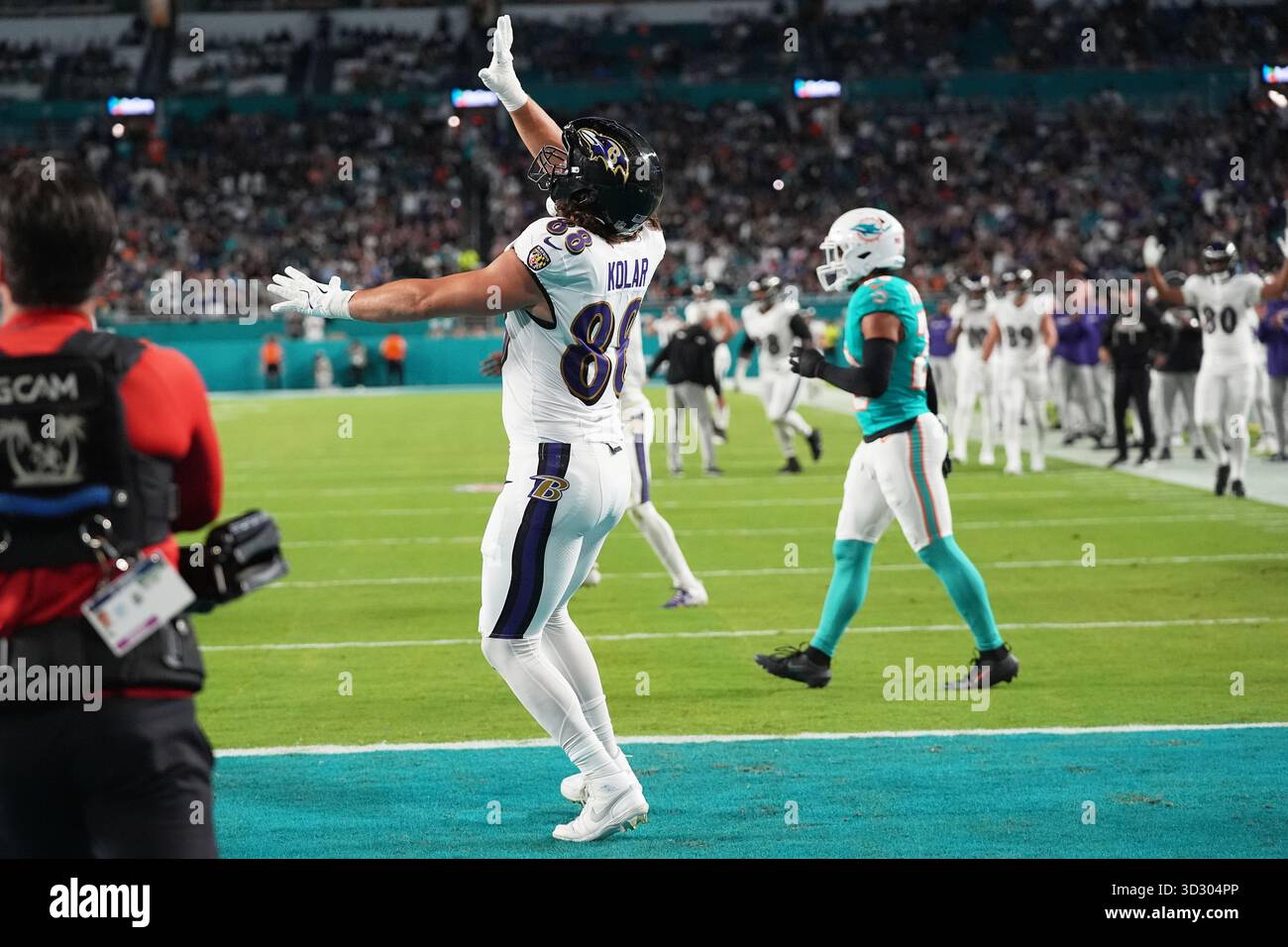 Baltimore Ravens tight end Charlie Kolar (88) reacts after scoring a ...