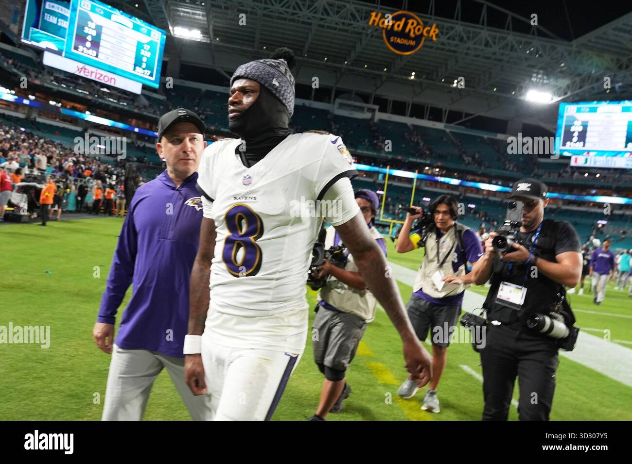 Baltimore Ravens quarterback Lamar Jackson (8) walks off the field ...