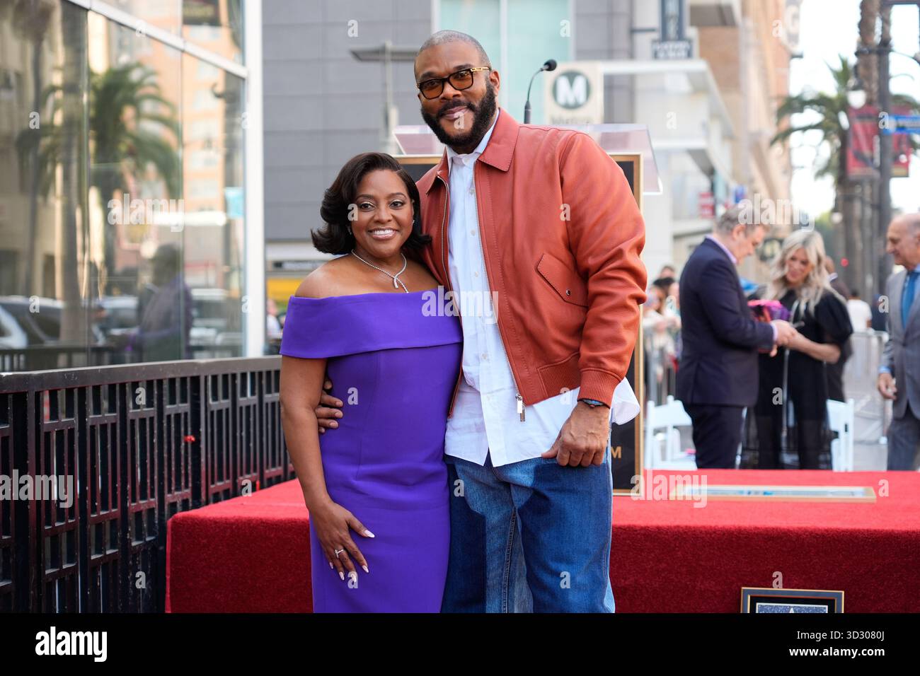 Sherry Shepherd, left, poses with Tyler Perry at a ceremony honoring ...