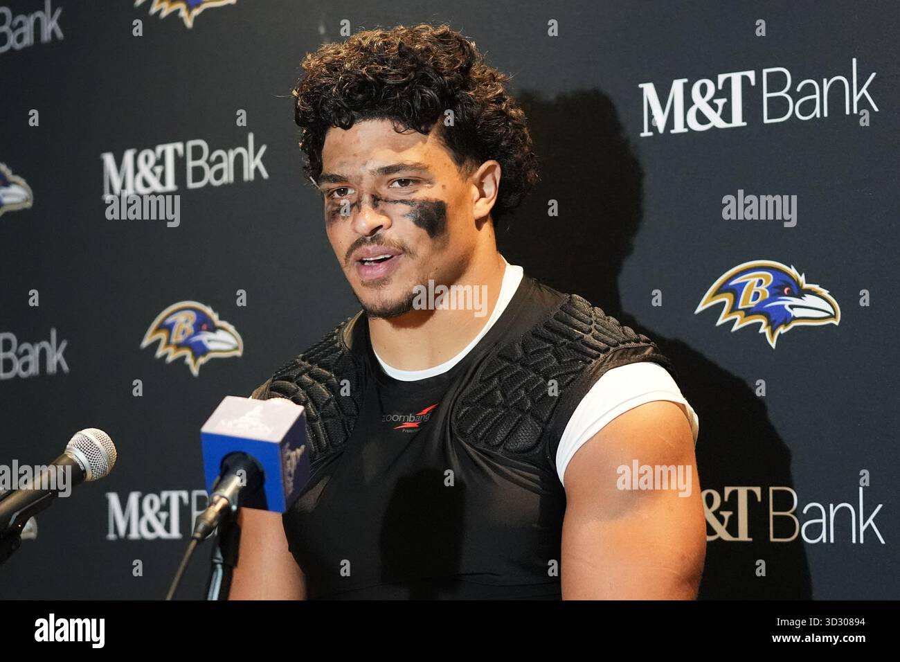 Baltimore Ravens linebacker Teddye Buchanan speaks during a news ...