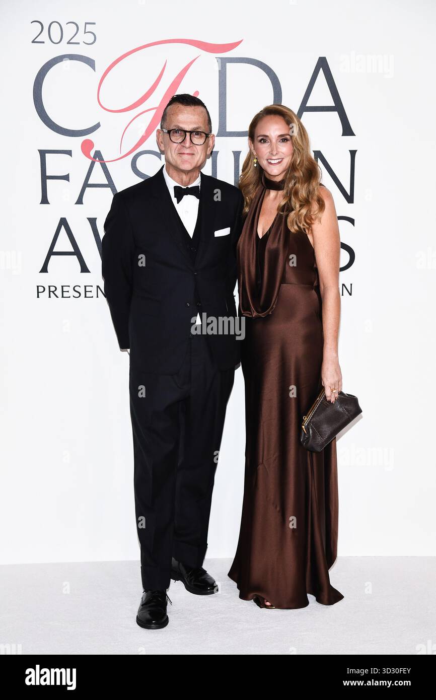 Steven Kolb and Jenny Freshwater walking on the red carpet at the 2025 ...