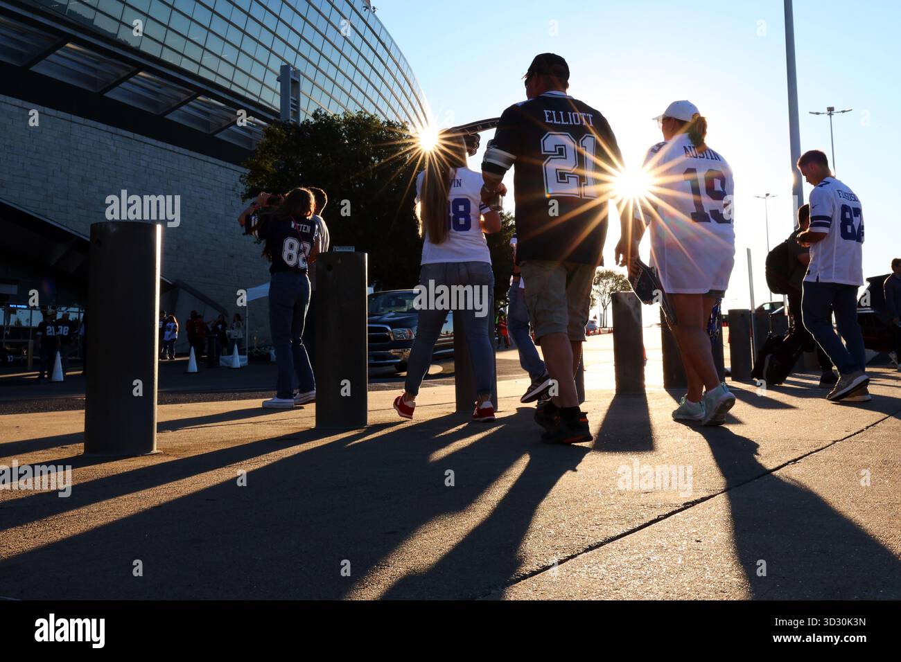 Fans arrive for an NFL football game between the Arizona Cardinals and ...