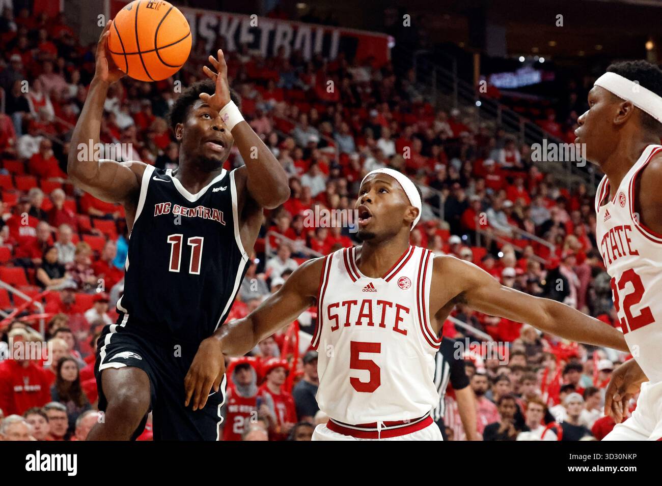 North Carolina Central's Gage Lattimore (11) drives the ball past North ...