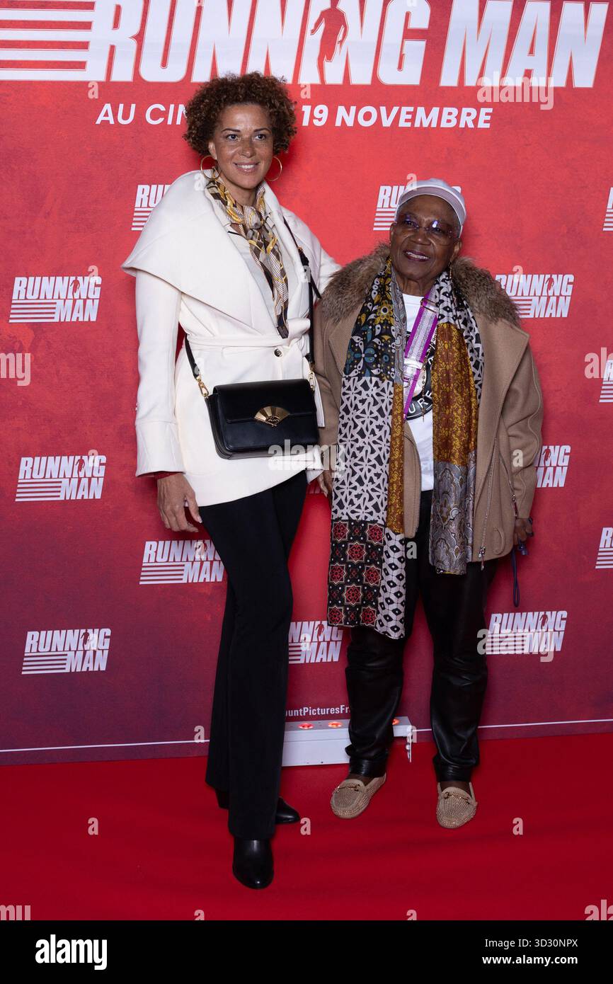Firmine Richard and a guest attends 'Running Man' Paris Film Premiere ...