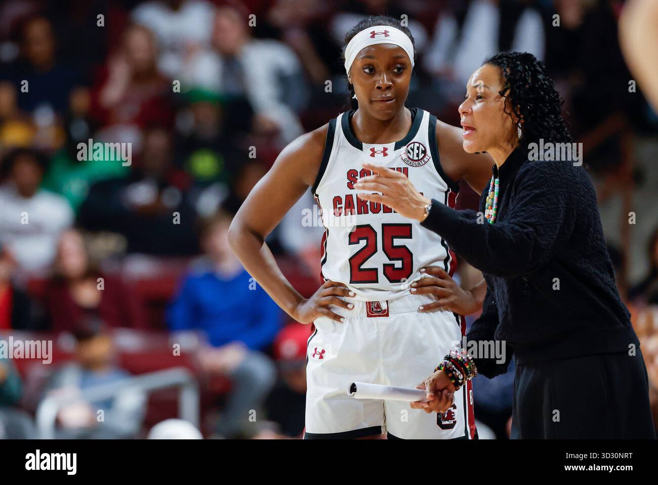South Carolina head coach Dawn Staley, right, talks to guard Raven ...