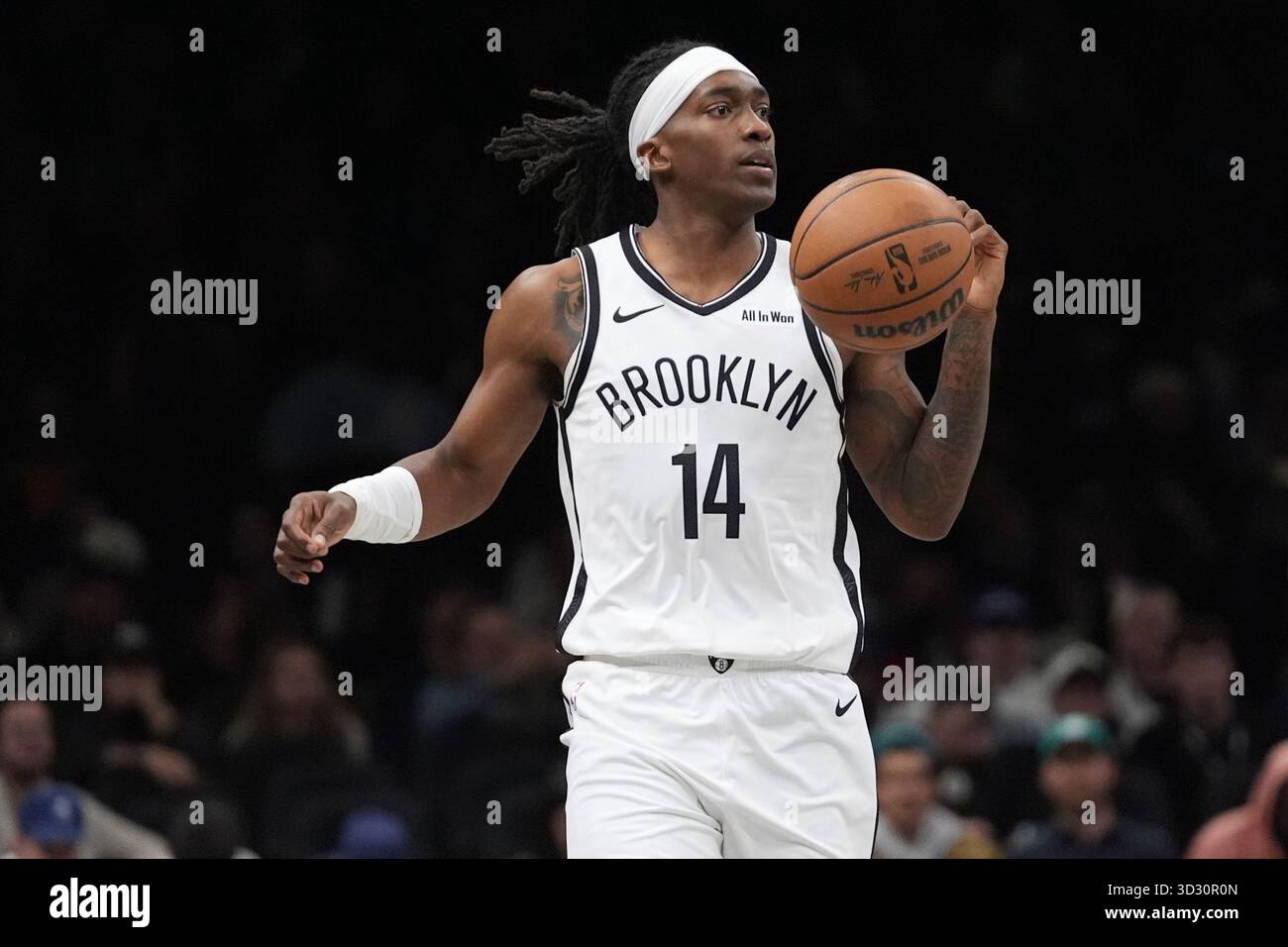 Brooklyn Nets' Terance Mann (14) looks to pass during the first half of ...
