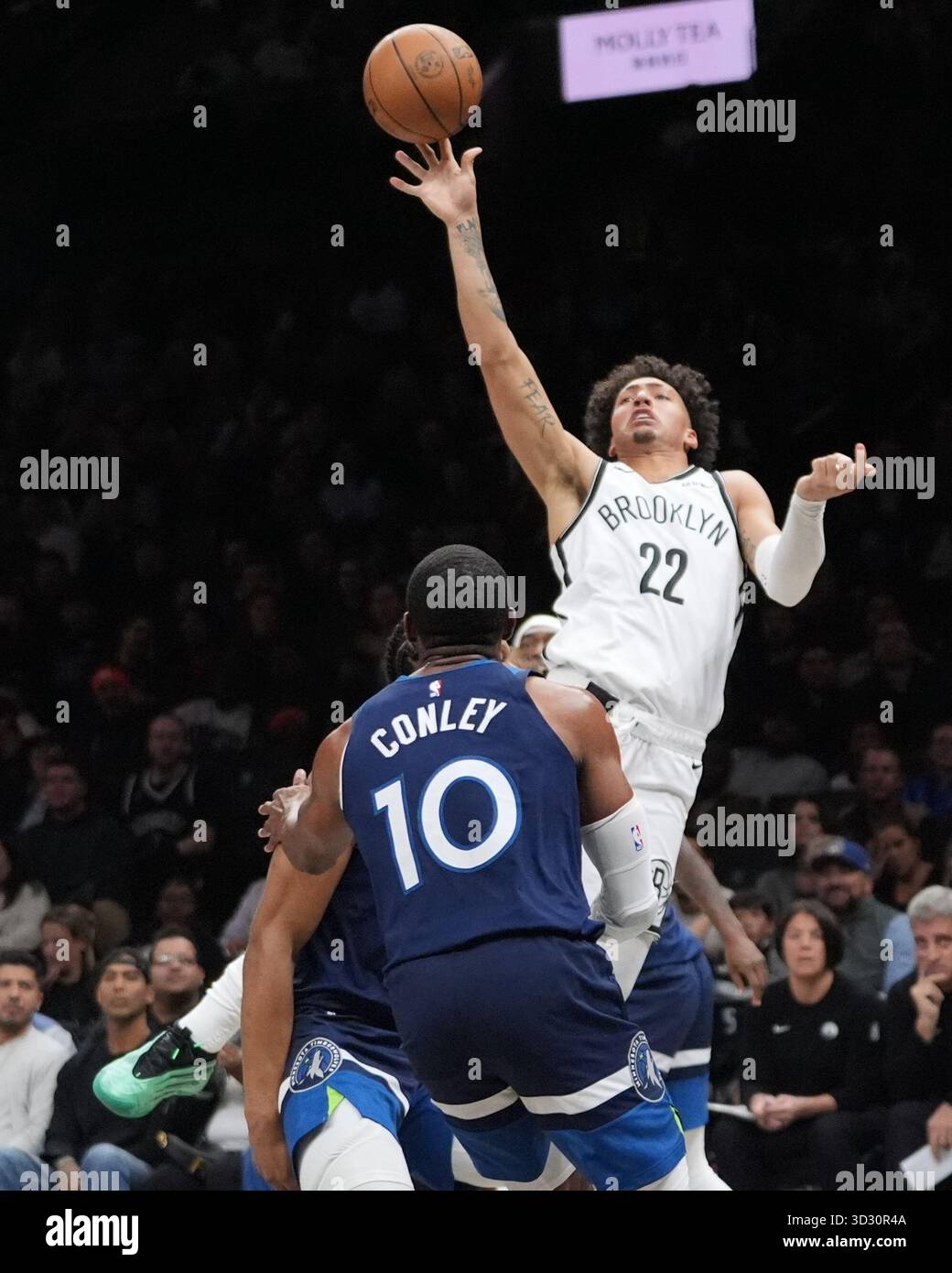 Brooklyn Nets' Jalen Wilson (22) shoots over Minnesota Timberwolves ...