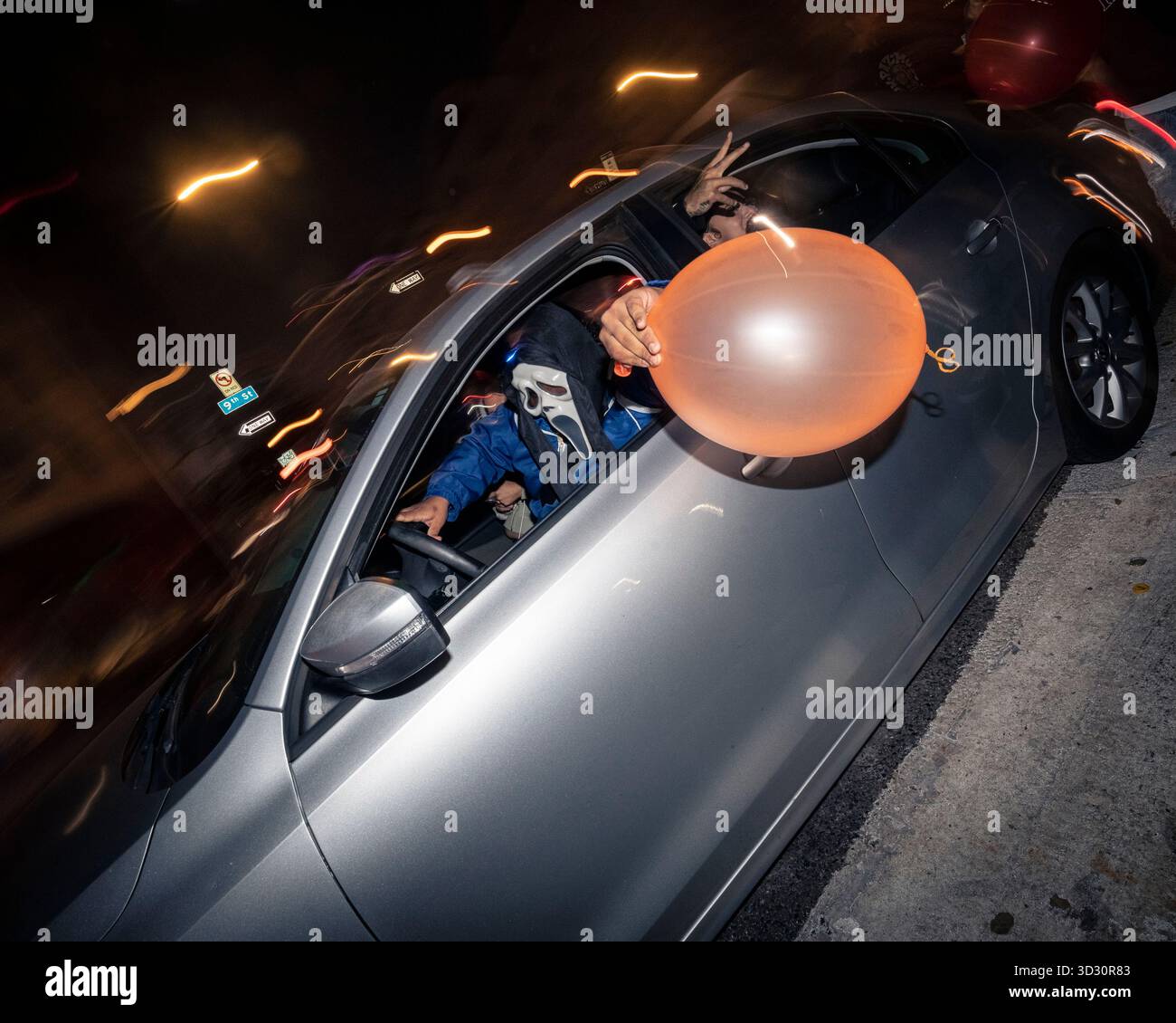 In Los Angeles, baseball fans hand passersby nitrous balloons to ...