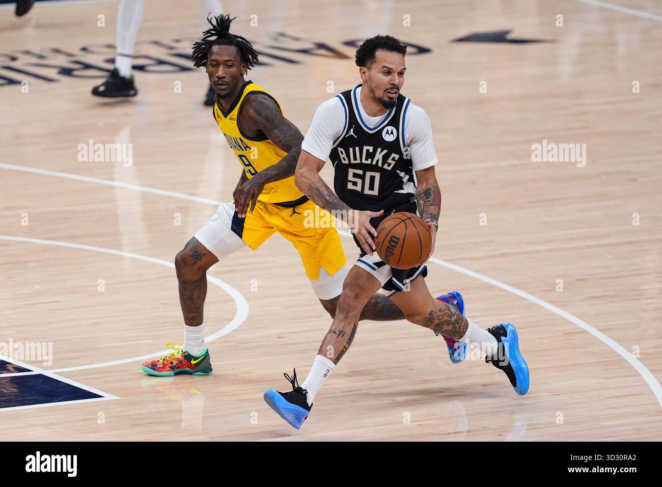 Milwaukee Bucks guard Cole Anthony (50) drives on Indiana Pacers guard ...