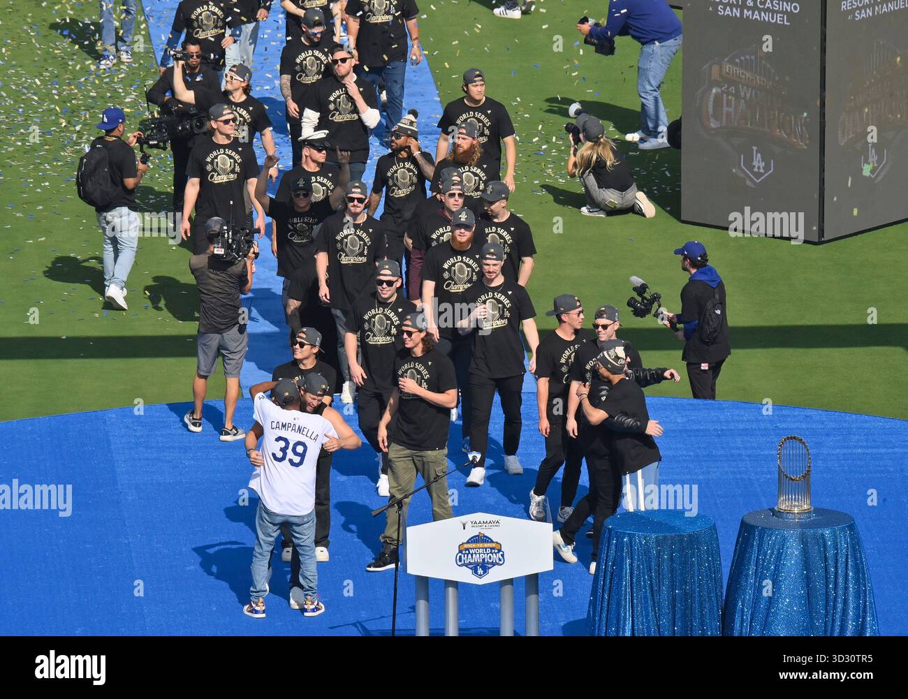 The Los Angeles Dodgers arrive to celebrate their World Series win with ...