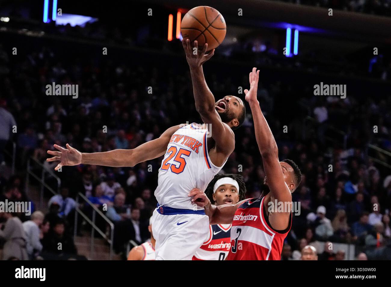 New York Knicks guard Mikal Bridges (25) shoot over Washington Wizards ...
