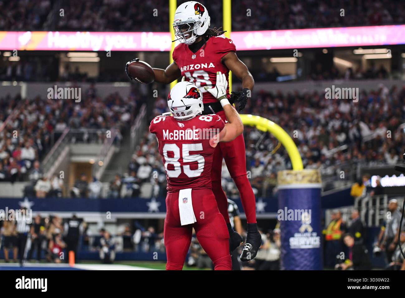 Arizona Cardinals' Marvin Harrison Jr. (18) and Trey McBride (85 ...