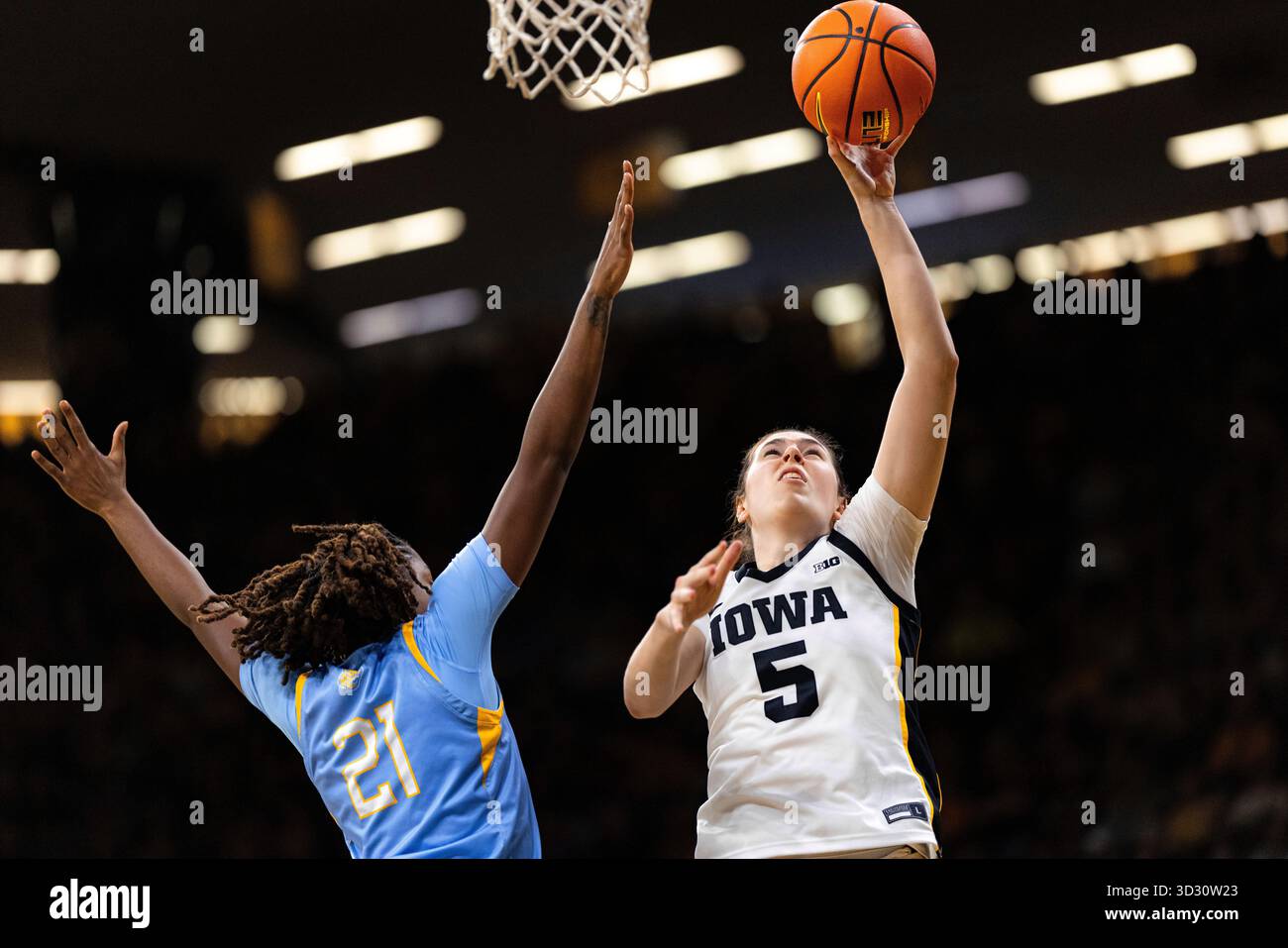 Iowa center Ava Heiden (5) shoots the ball against a Southern player ...