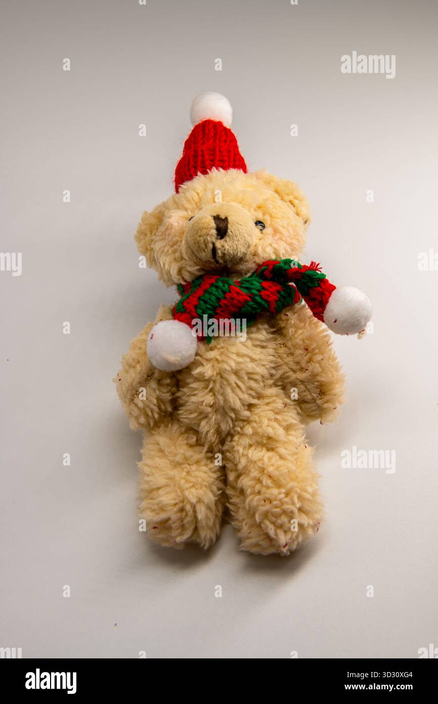 Cute teddy bear wearing santa claus suit to celebrate christmas on ...