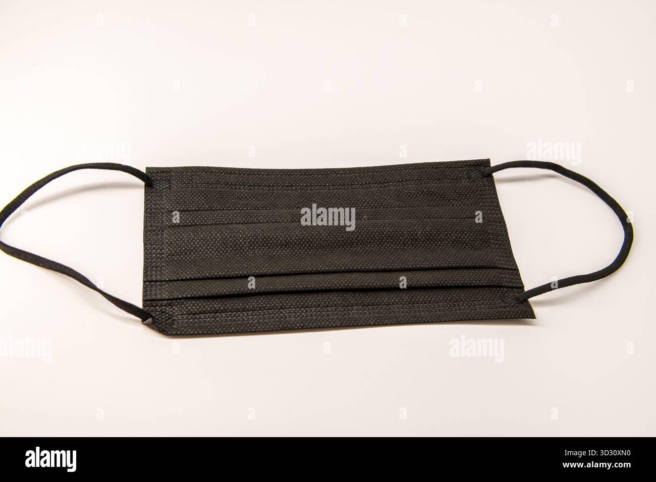 Black mask isolated on a white background. Extremely effective at ...