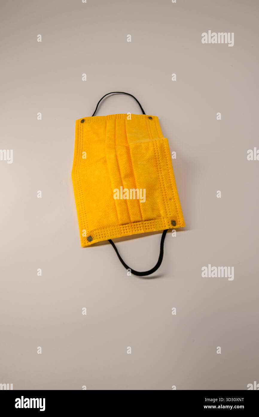 Medical sterile disposable mask, white background. orange surgical mask ...