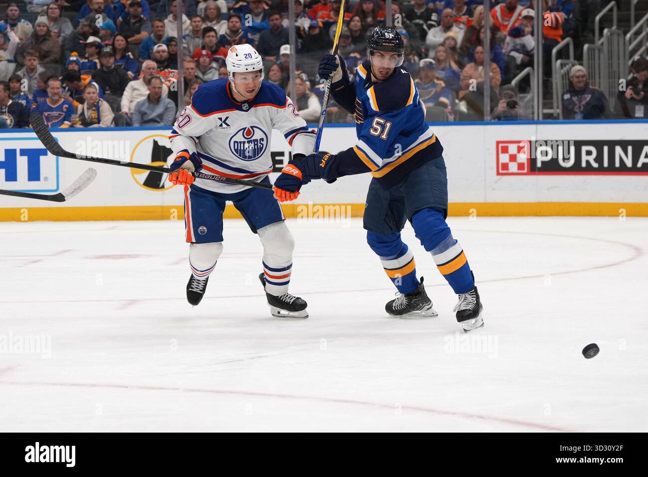 Edmonton Oilers' Curtis Lazar (20) and St. Louis Blues' Matthew Kessel ...