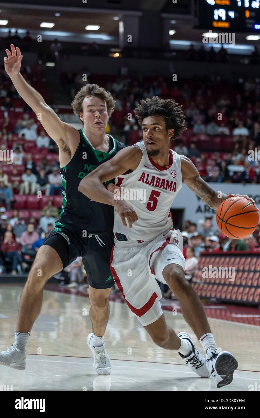 Alabama forward Amari Allen (5) dribbles against North Dakota guard ...