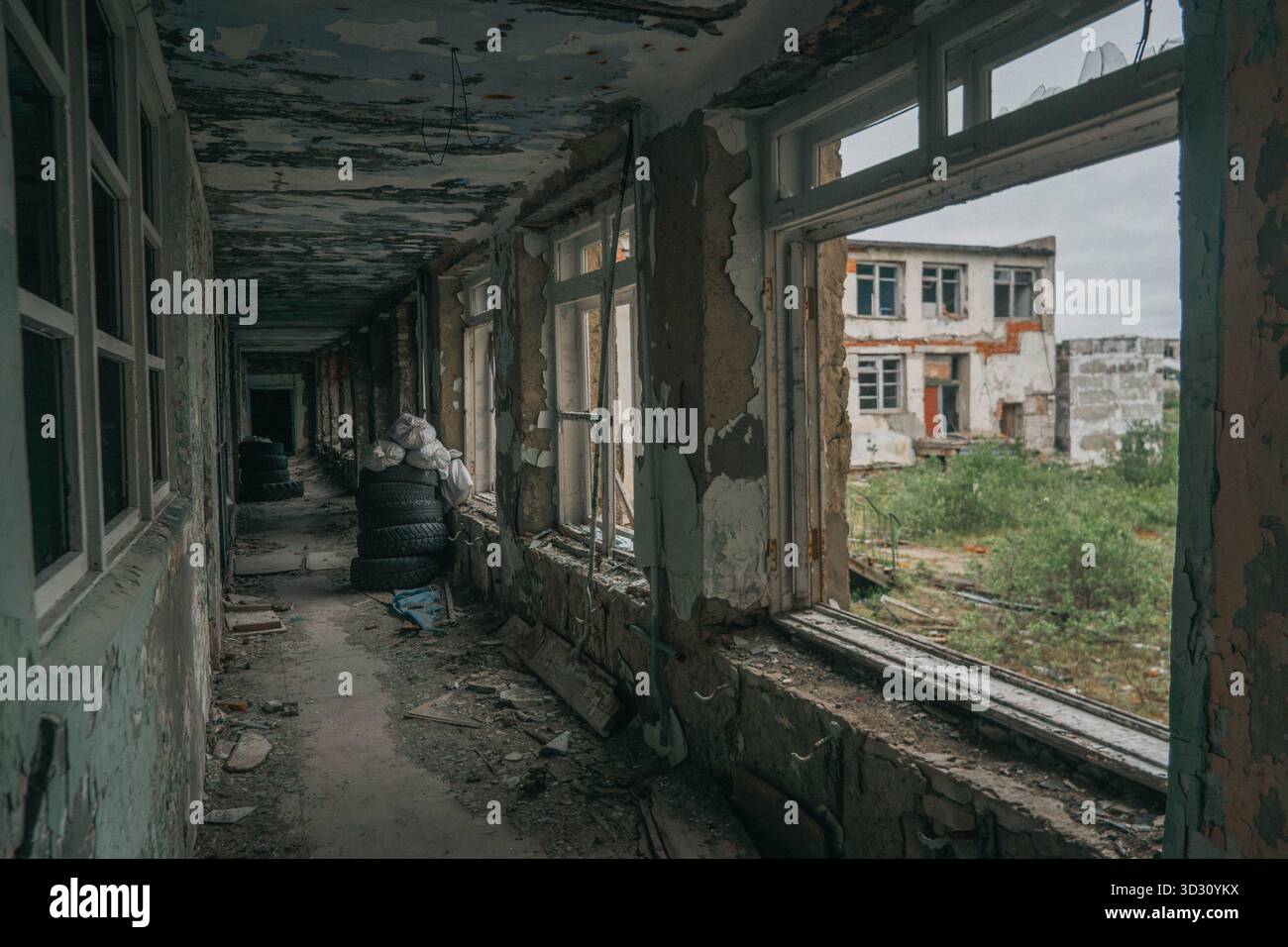 Horror corridor in abandoned Soviet building, in Ugolnye Kopi, Chukotka ...