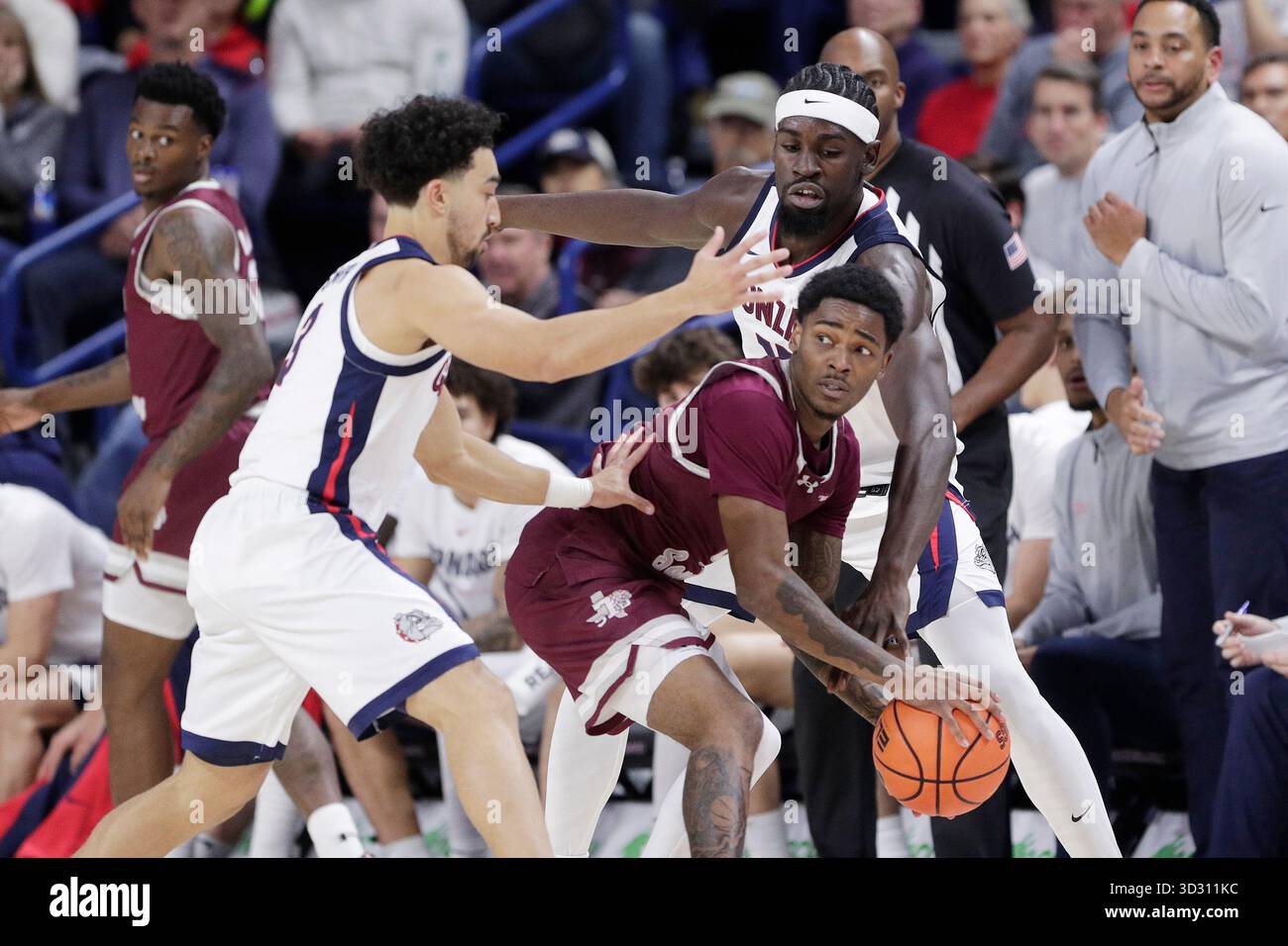 Gonzaga guard Braeden Smith, left, and forward Graham Ike, right ...