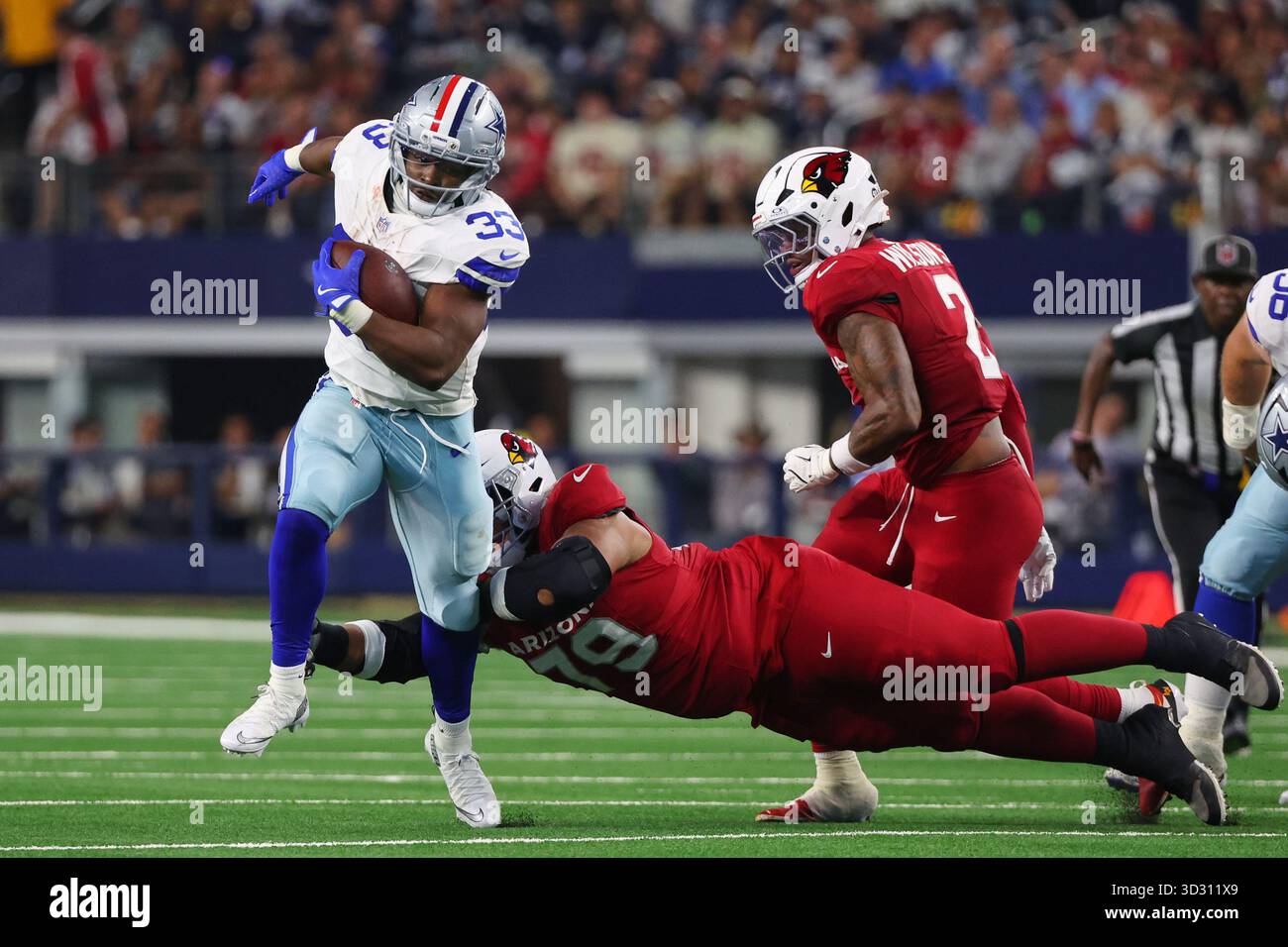 Dallas Cowboys running back Javonte Williams (33) runs the ball as ...
