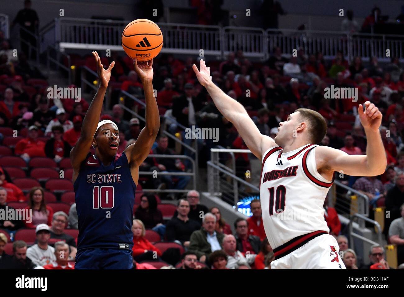 South Carolina State guard Jayden Johnson (10) shoots over Louisville ...