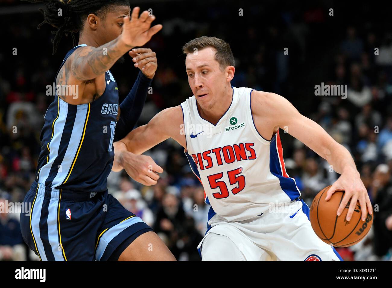 Detroit Pistons forward Duncan Robinson (55) handles the ball against ...