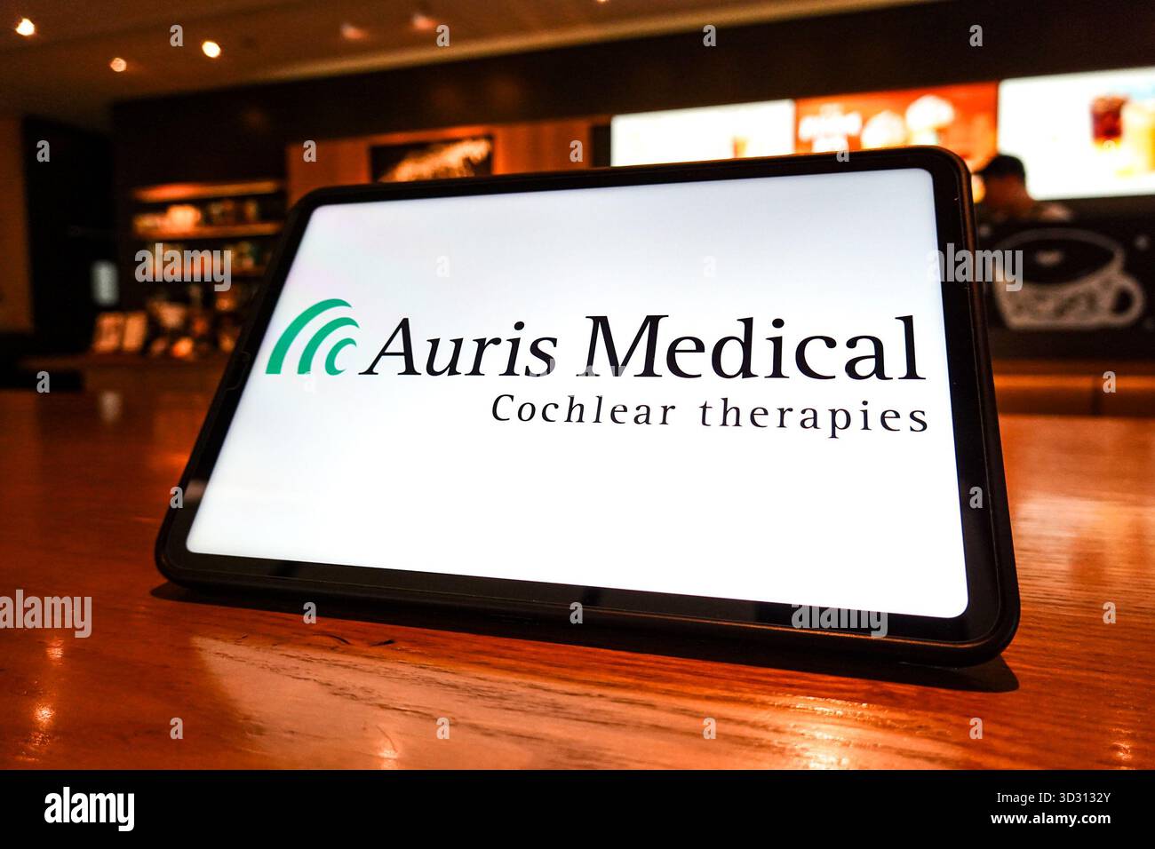 In this photo illustration, the Auris Medical logo is displayed on the ...