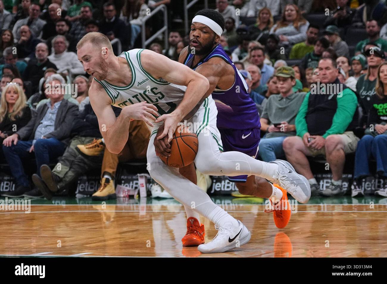 Utah Jazz guard Elijah Harkless, right, strips the ball from Boston ...