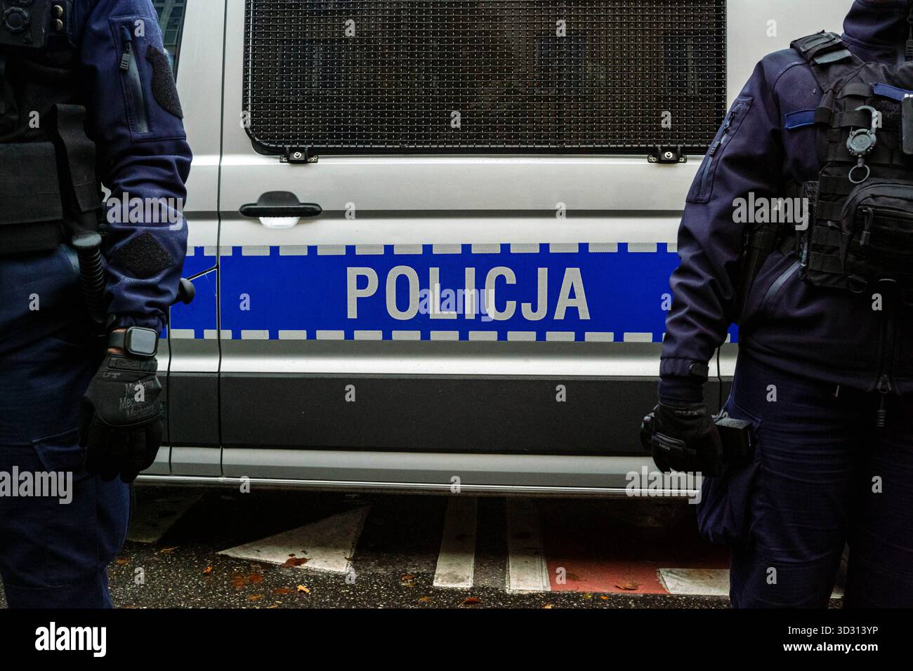 Polish police officers maintain order at a protest. A collection of ...
