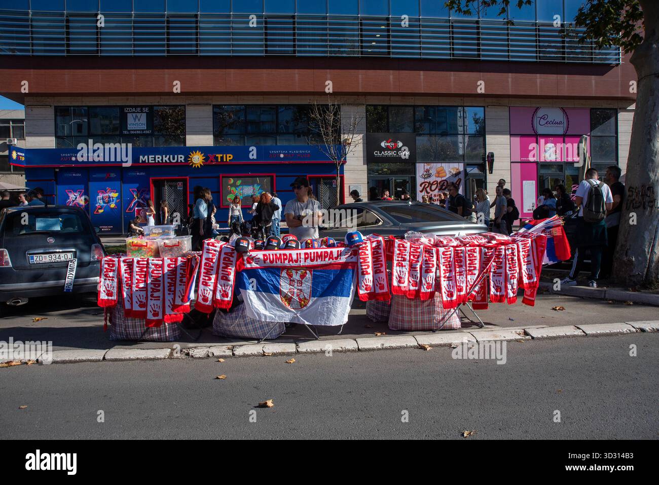 Novi Sad, Serbia. 01st Nov, 2025. A street vendor sells scarfs before ...