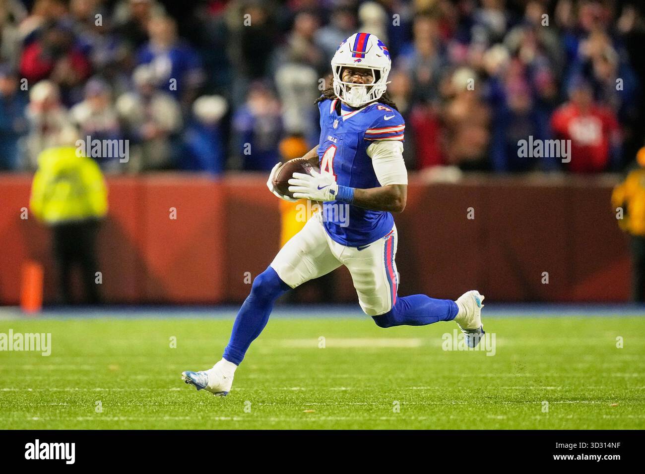 Buffalo Bills running back James Cook III (4) carries during an NFL ...