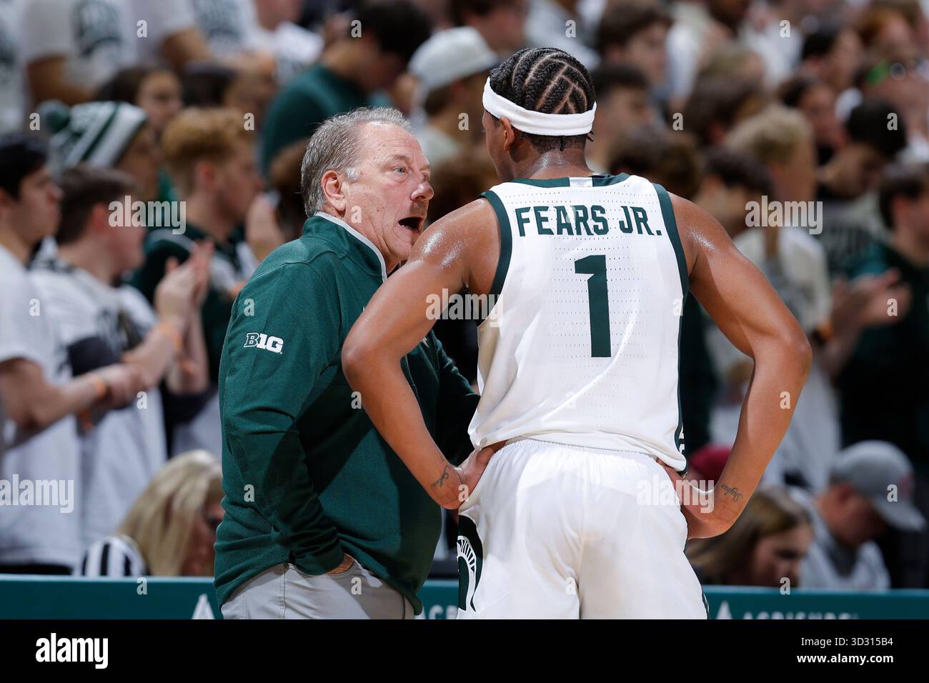 Michigan State coach Tom Izzo, left, talks with guard Jeremy Fears Jr ...