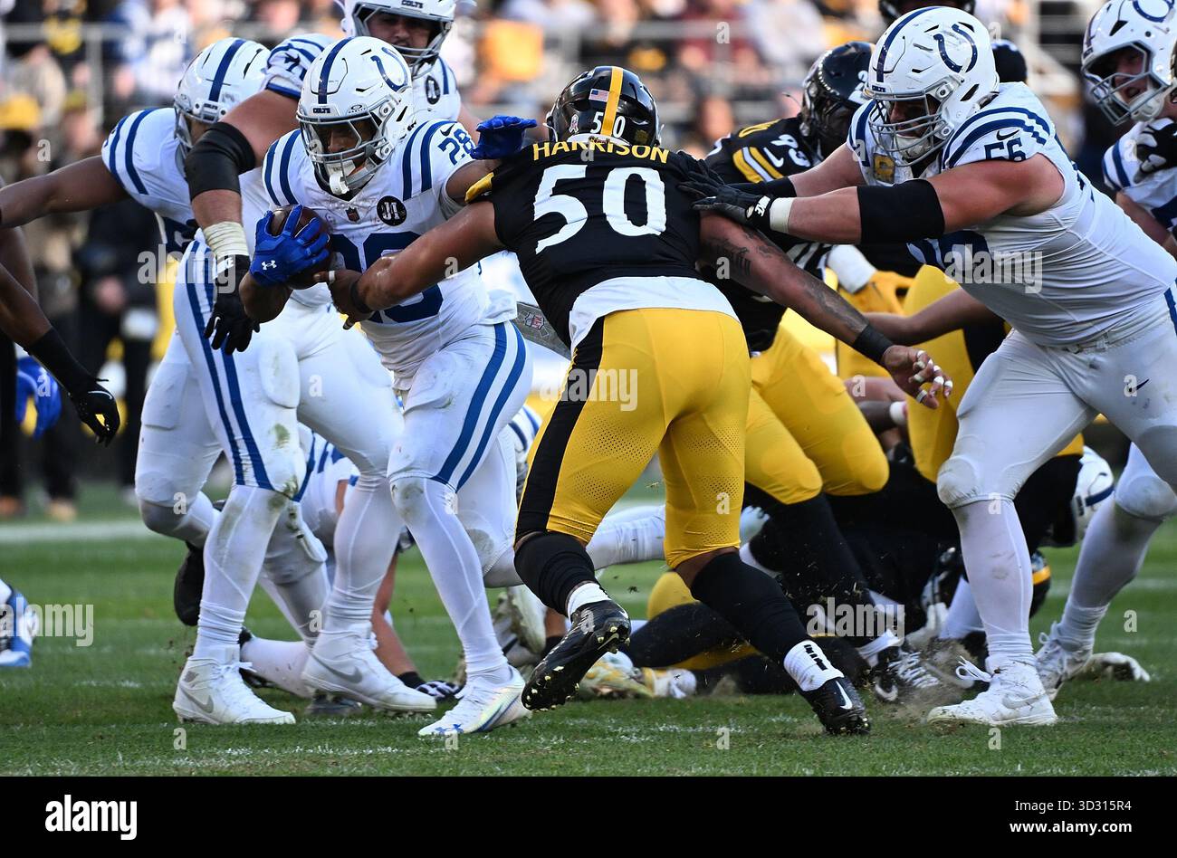 Indianapolis Colts running back Jonathan Taylor (28) is hit by ...