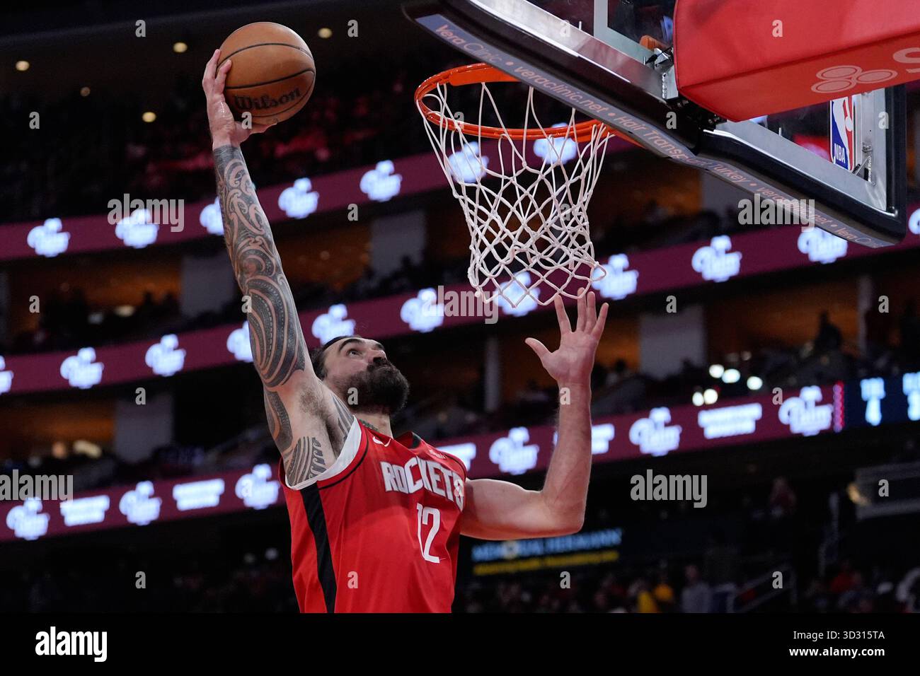 Houston Rockets center Steven Adams (12) dunks during the second half ...