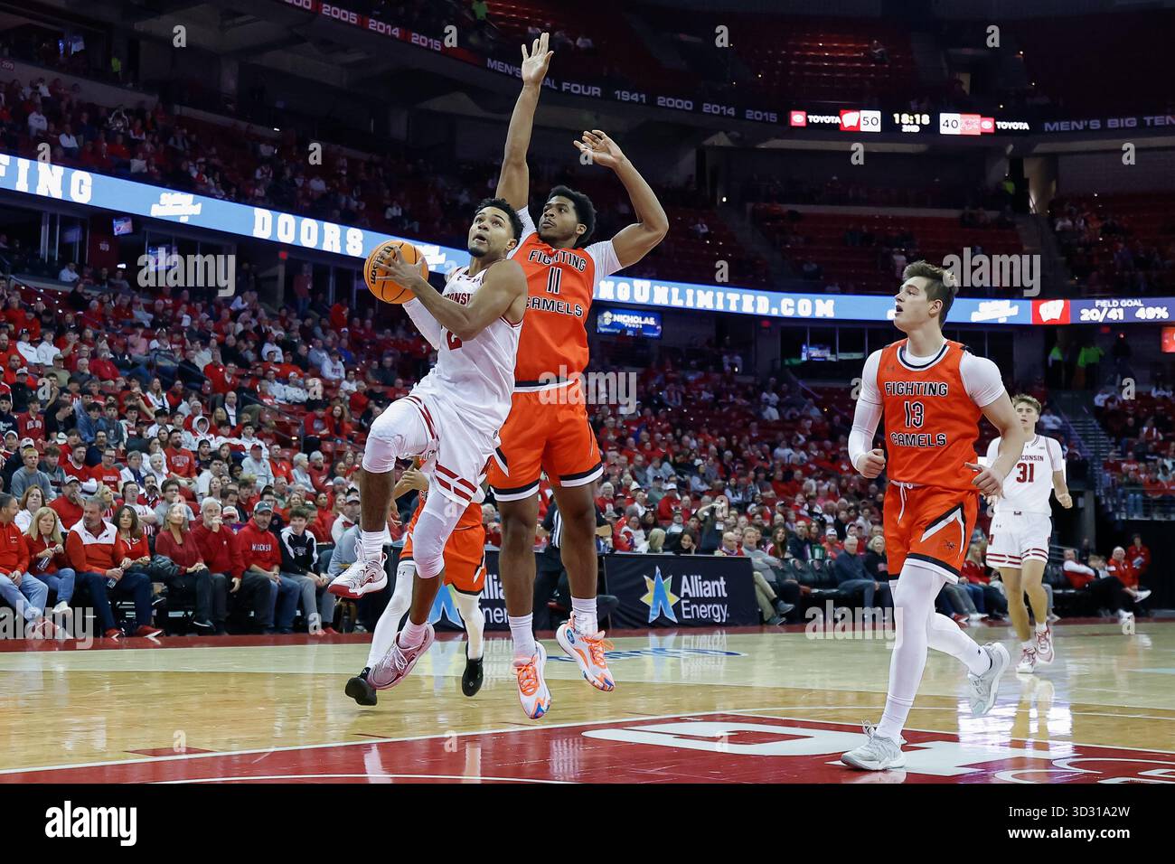 November 3, 2025: Wisconsin Badgers guard Nick Boyd (2) goes in for a reverse layup during the ...