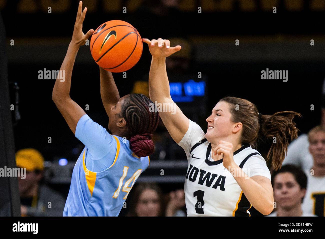 Iowa guard Taylor Stremlow (1) blocks a shot by a Southern player ...