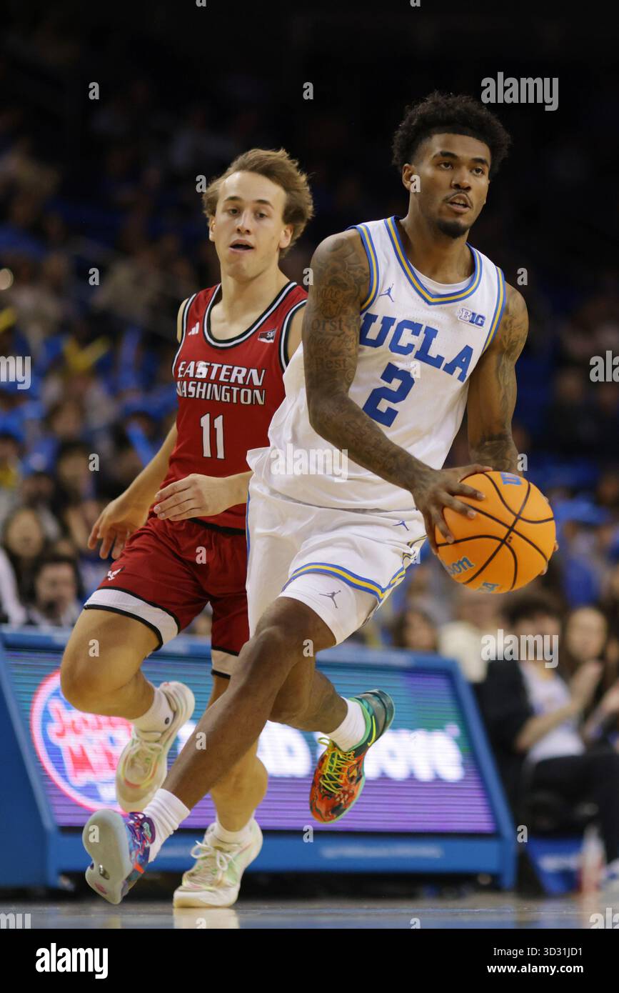UCLA guard Donovan Dent (2) is defended by Eastern Washington guard ...