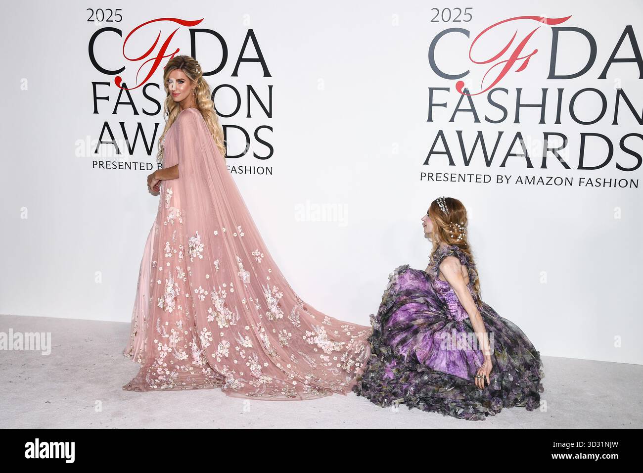 Nicky Hilton Rothschild and Stacey Bendet Weiner walking on the red ...