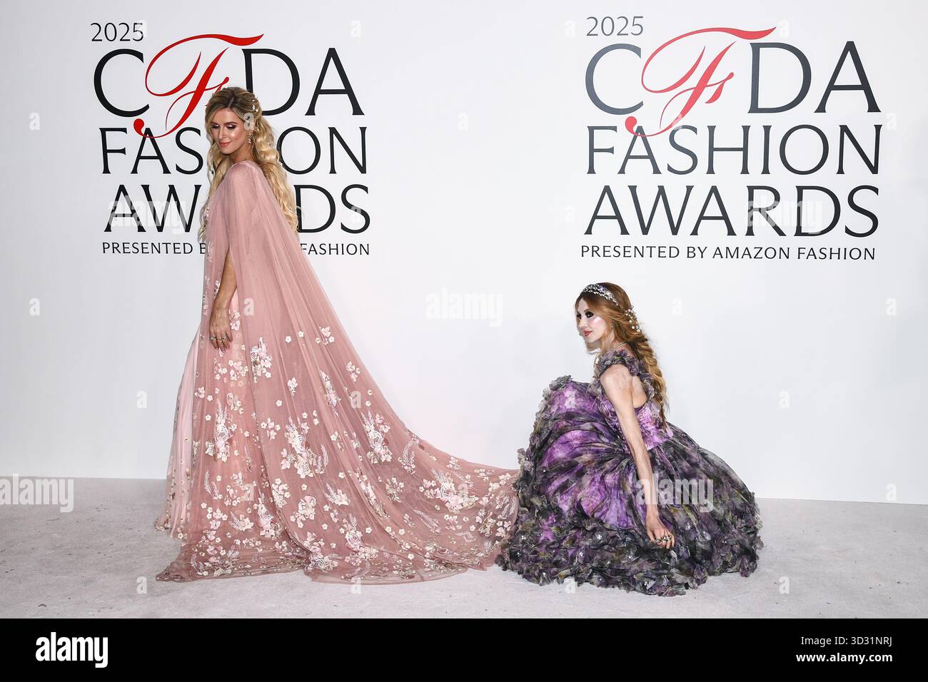Nicky Hilton Rothschild and Stacey Bendet Weiner walking on the red ...