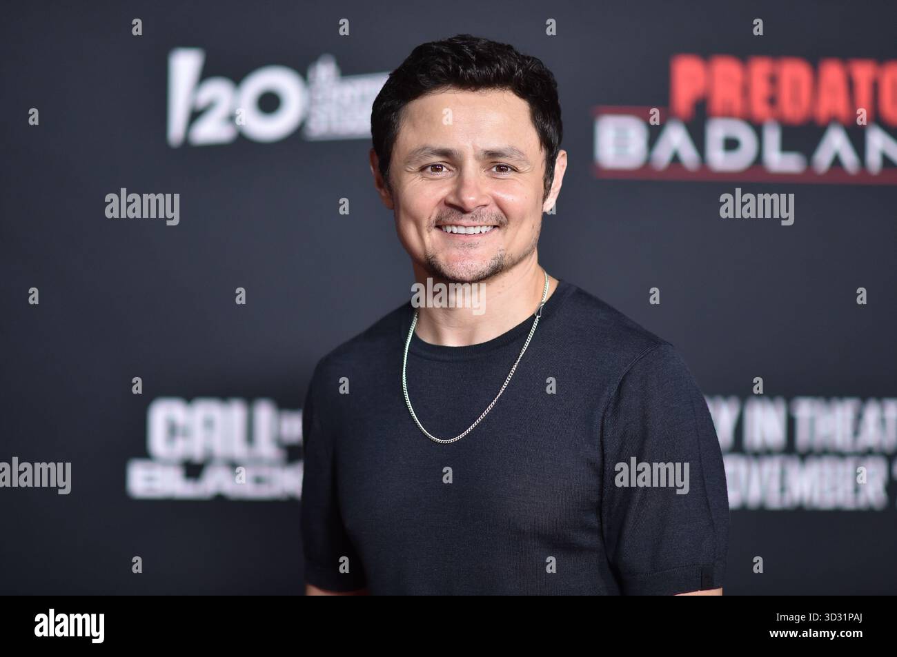 Arturo Castro arrives at the premiere of "Predator: Badlands" on Monday ...