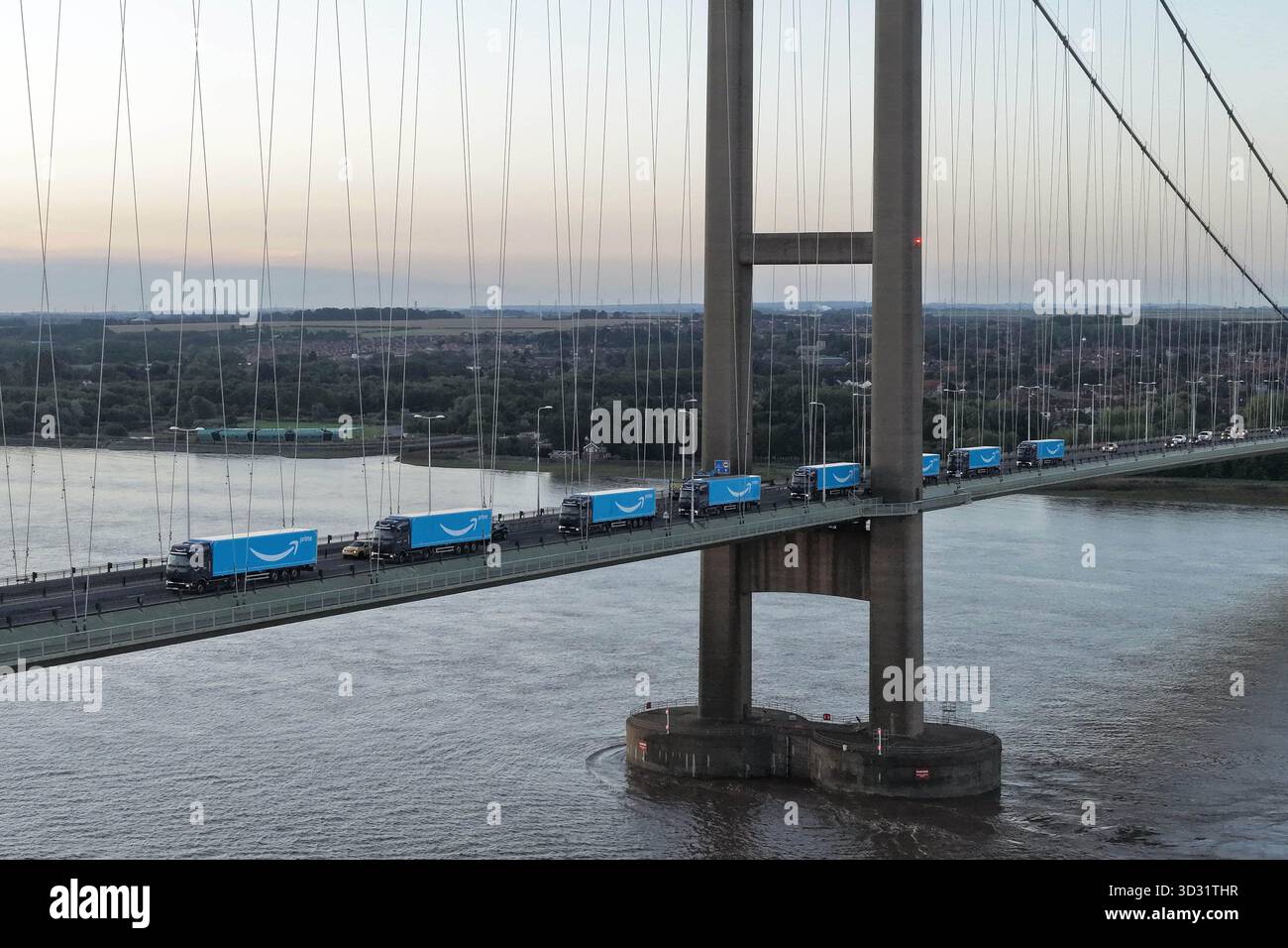 EDITORIAL USE ONLY A convoy of electric heavy-goods vehicles (eHGVs ...