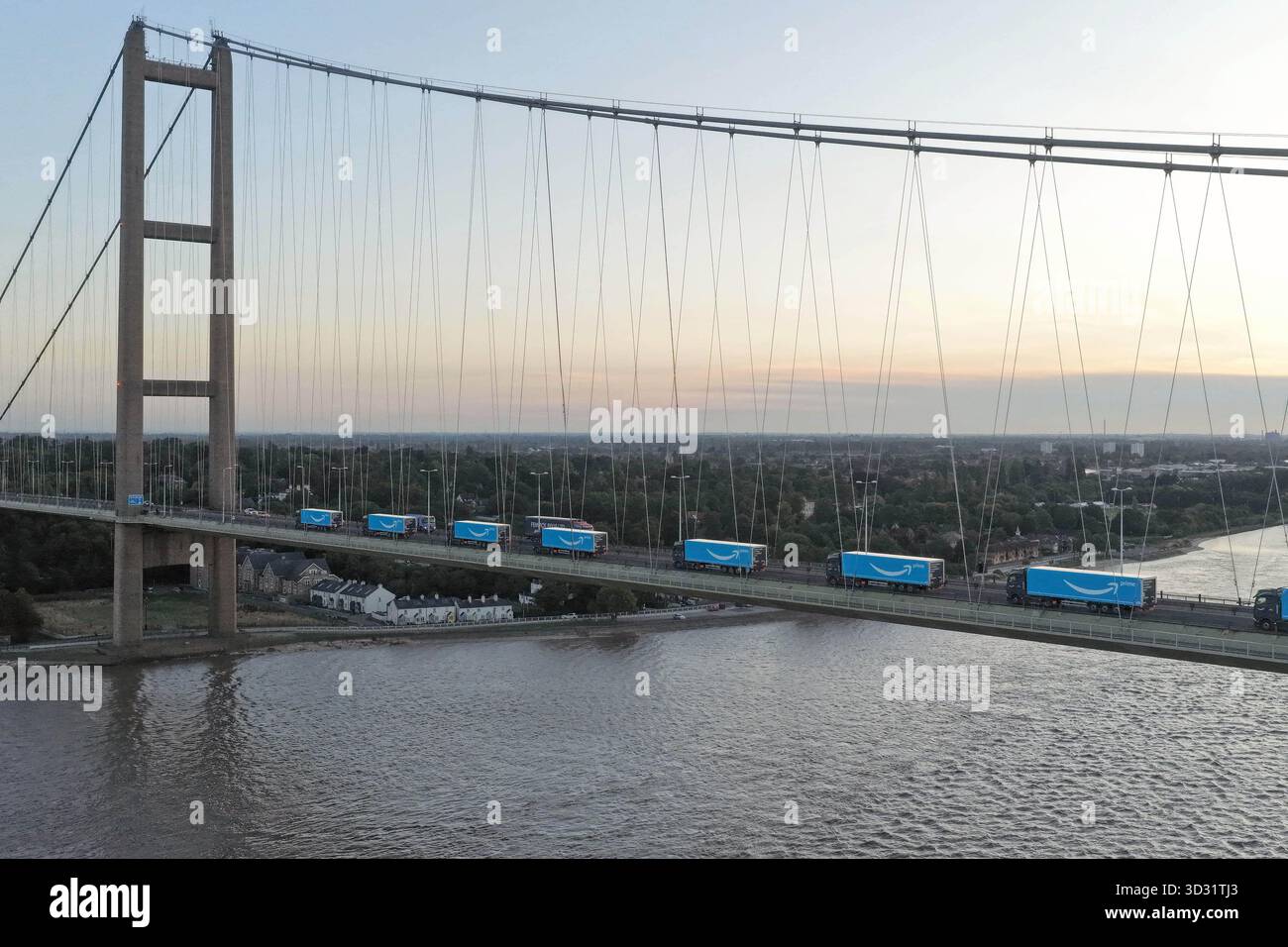 EDITORIAL USE ONLY A convoy of electric heavy-goods vehicles (eHGVs ...