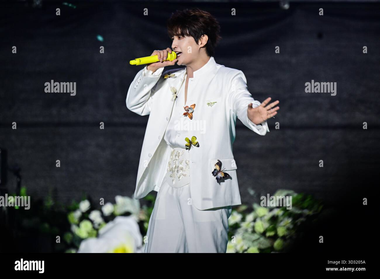 Chinese singer Zhang Yuan performs in Suzhou City, east China's Jiangsu ...