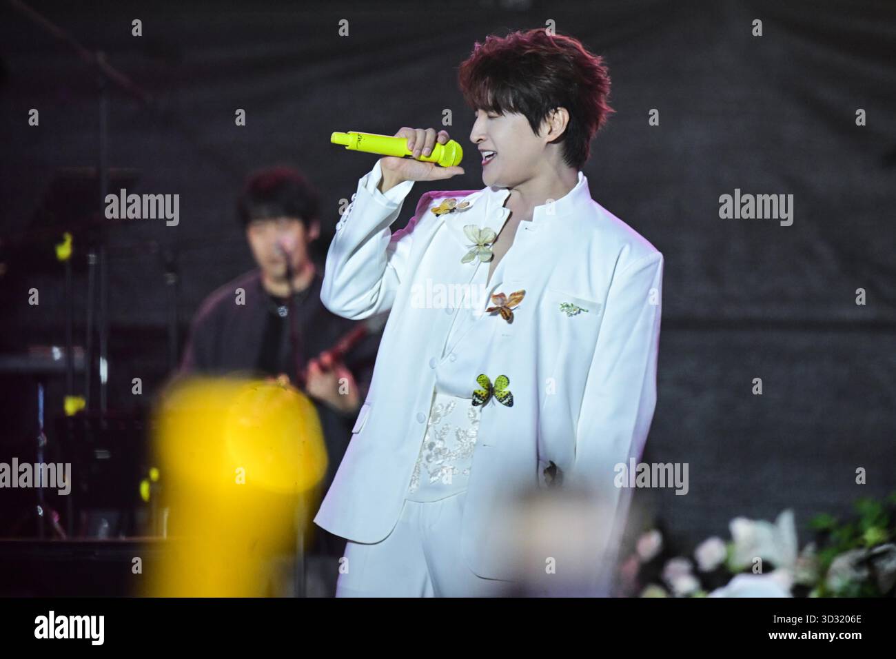 Chinese singer Zhang Yuan performs in Suzhou City, east China's Jiangsu ...