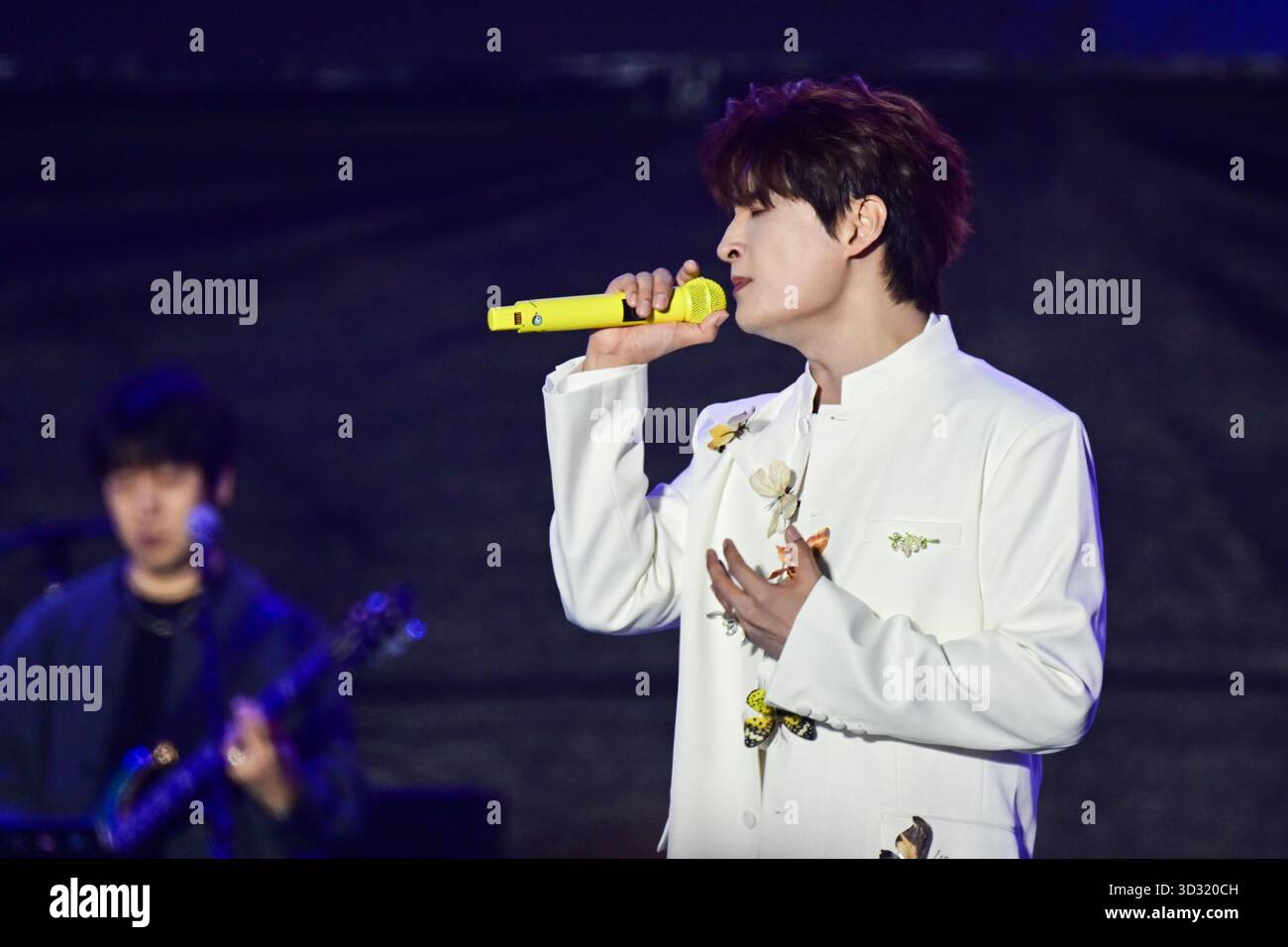Chinese singer Zhang Yuan performs in Suzhou City, east China's Jiangsu ...
