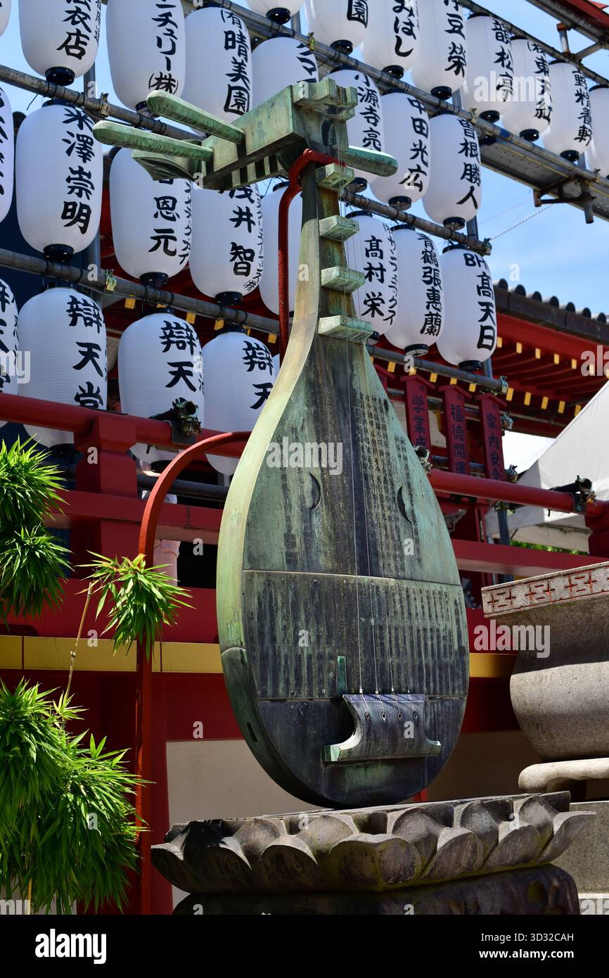 Statue of a Biwa musical instrument outside Gojoten-jinja Shrine, Ueno ...