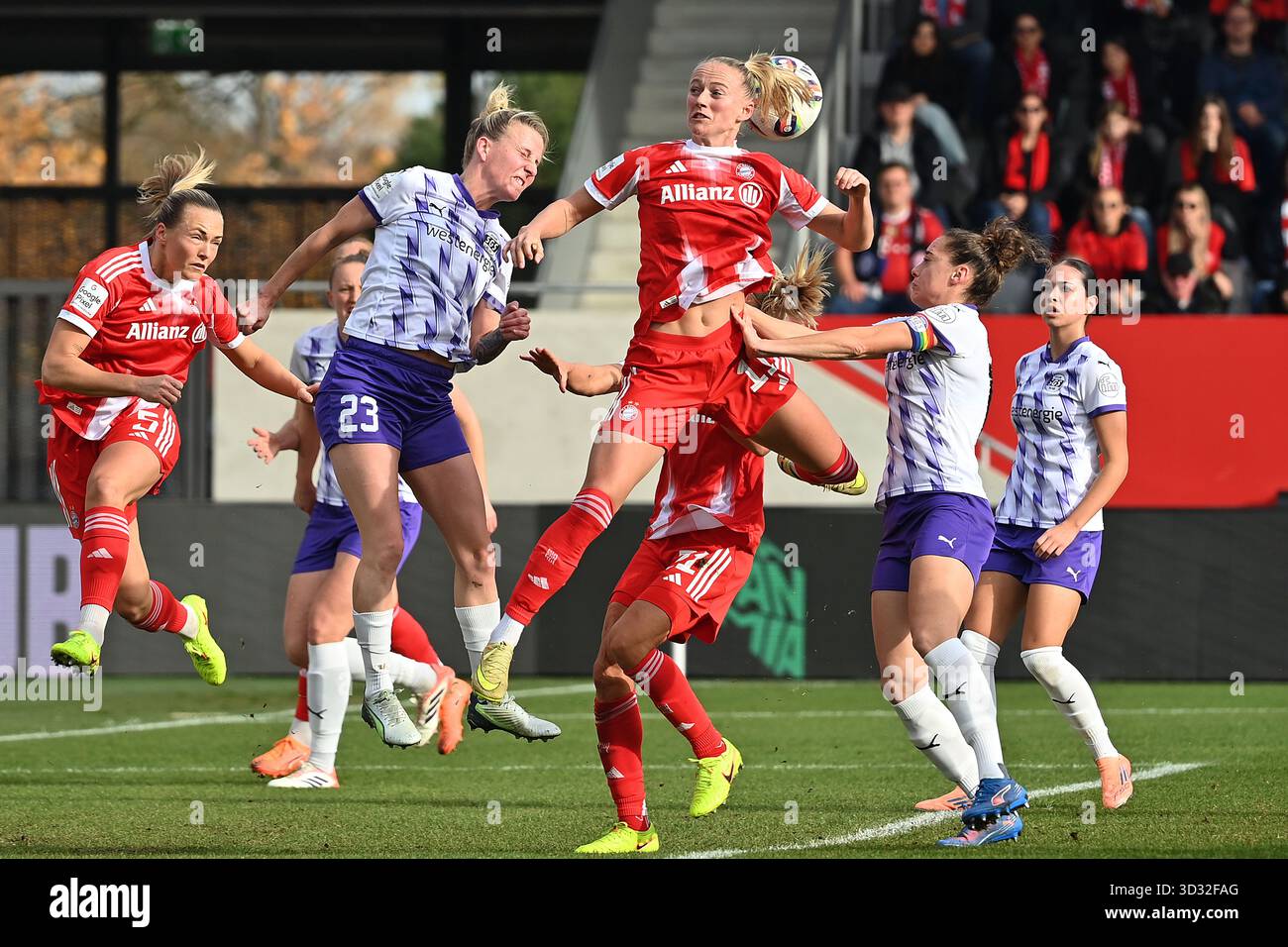 Penalty area scene with Lea Schueller (FCB), header, action, duel ...