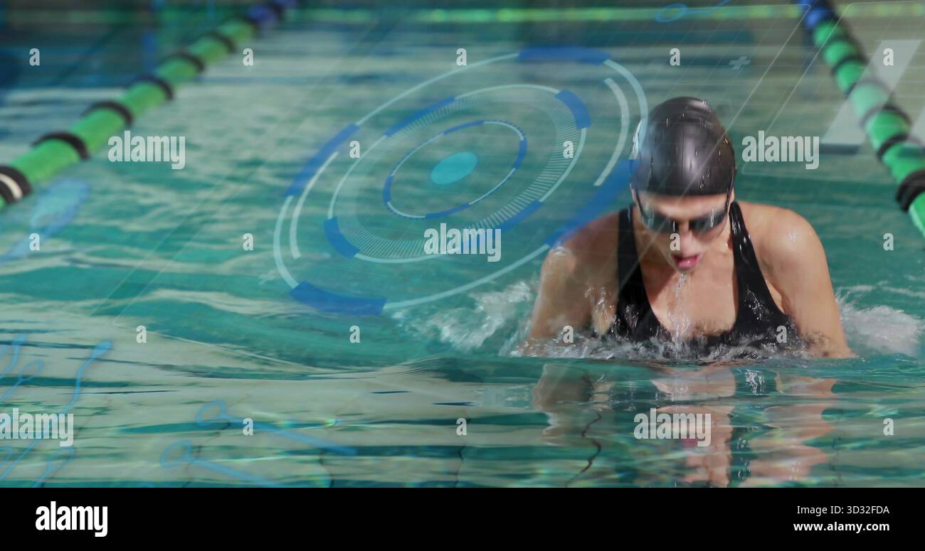 Emerging swimmer executing breaststroke pull at pool in swimsuit with ...